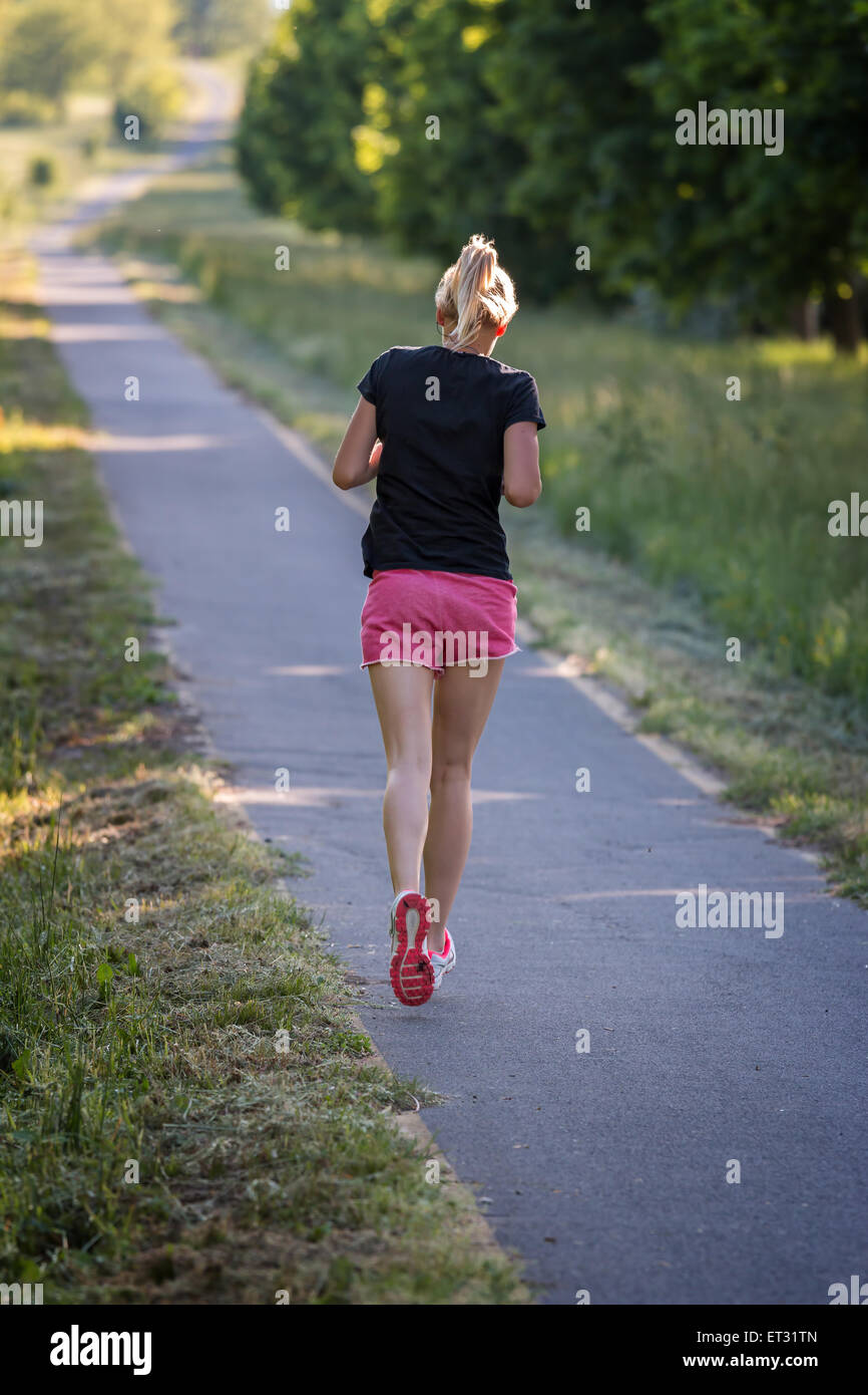 Young girl while training for a competition in spring Stock Photo - Alamy
