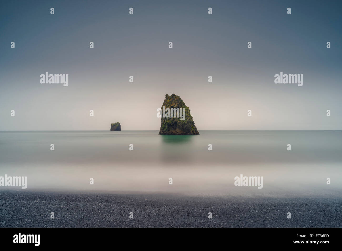 Basalt sea stacks in the ocean, Dyrholaey, Iceland Stock Photo - Alamy
