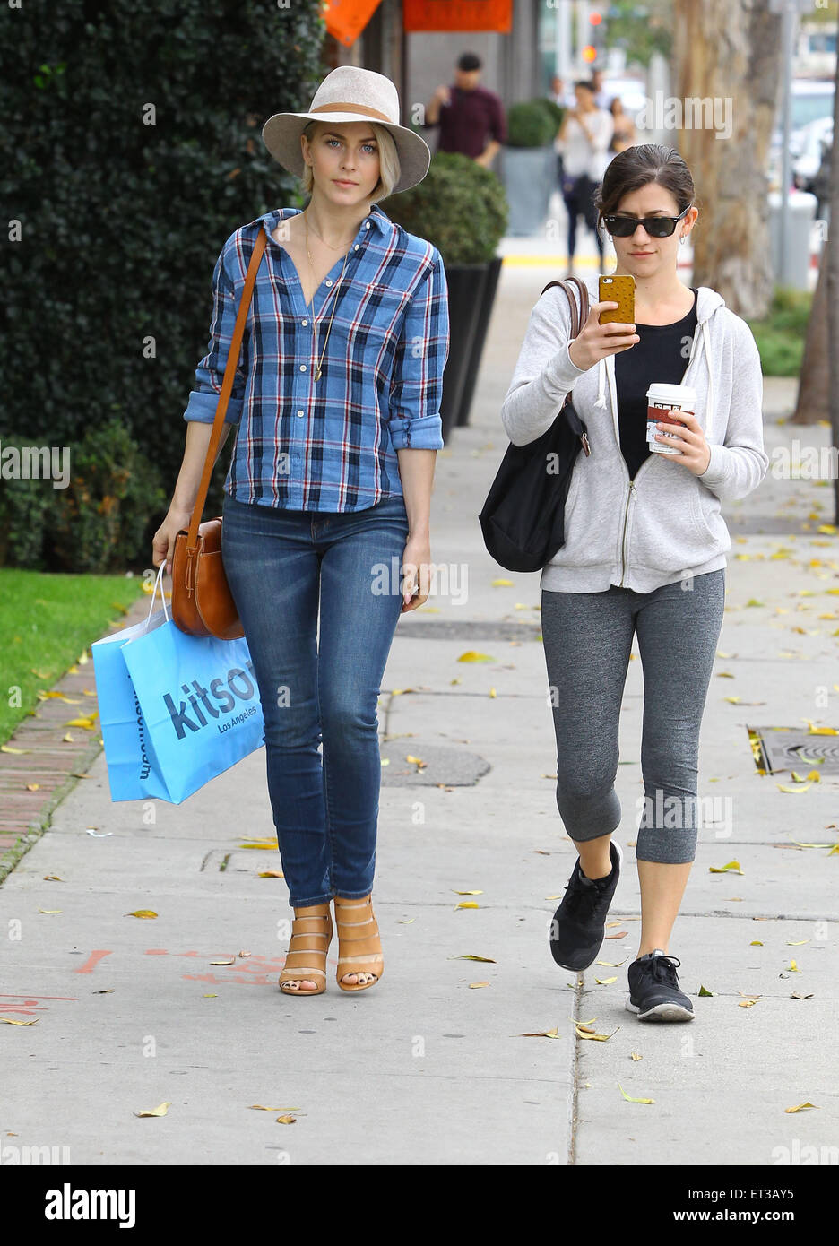 Julianne Hough in open necked blue checked shirt and jeans goes ...