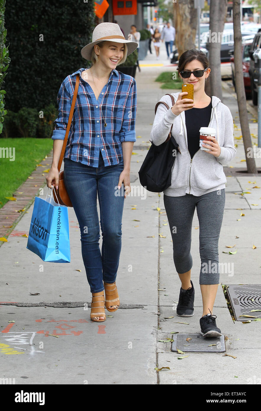 Julianne Hough in open necked blue checked shirt and jeans goes ...