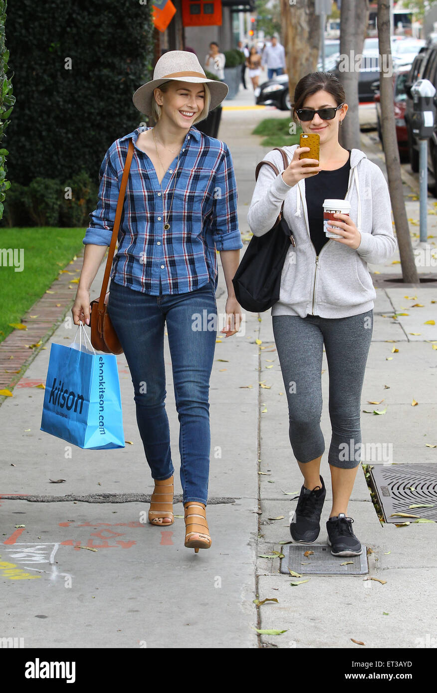 Julianne Hough in open necked blue checked shirt and jeans goes ...