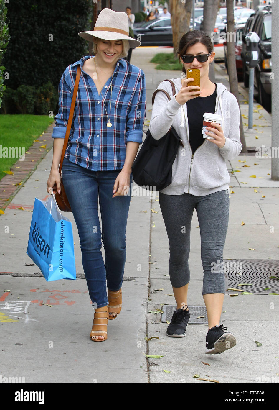 Julianne Hough in open necked blue checked shirt and jeans goes ...
