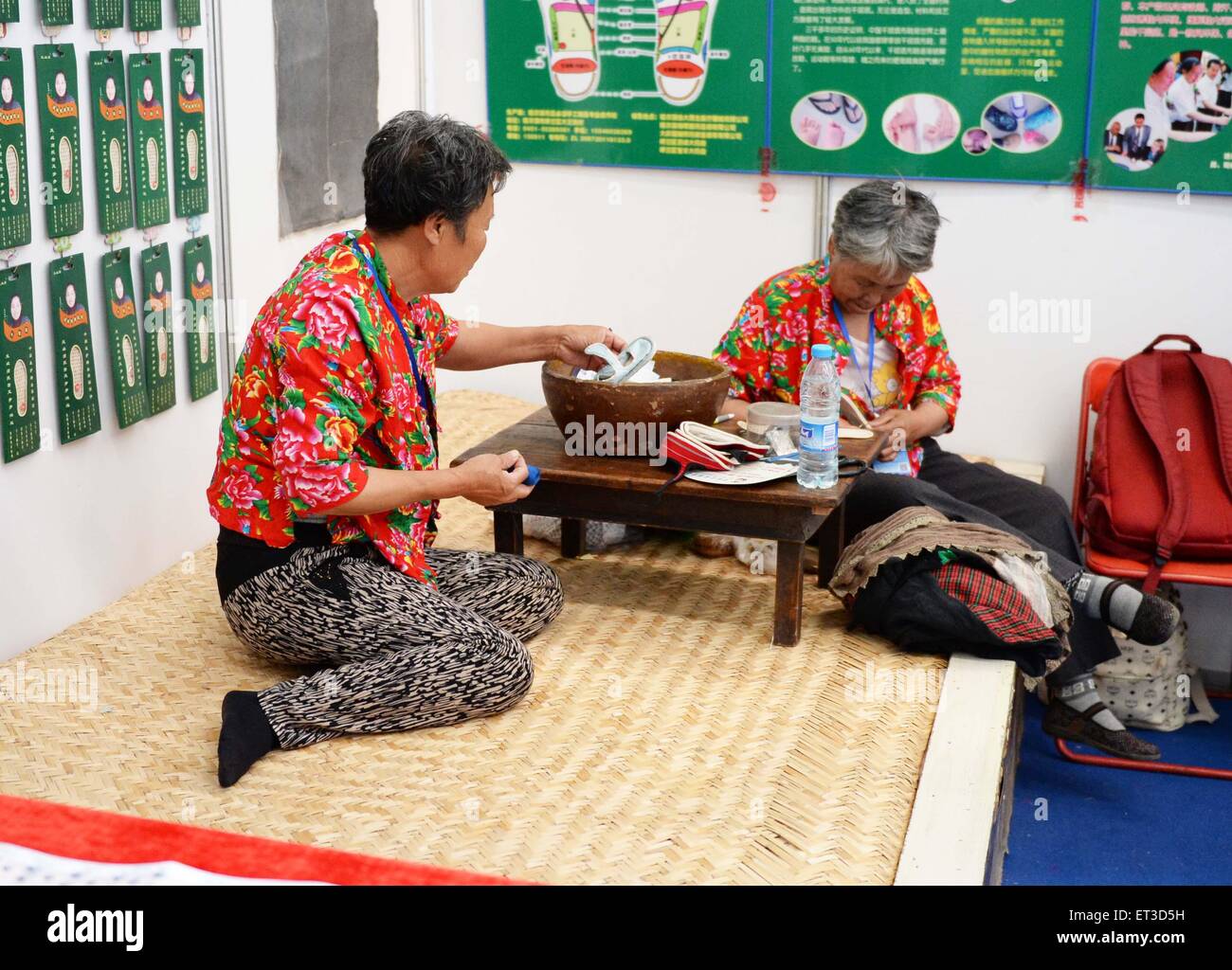 Harbin, China's Heilongjiang Province. 11th June, 2015. Exhibitors show ...