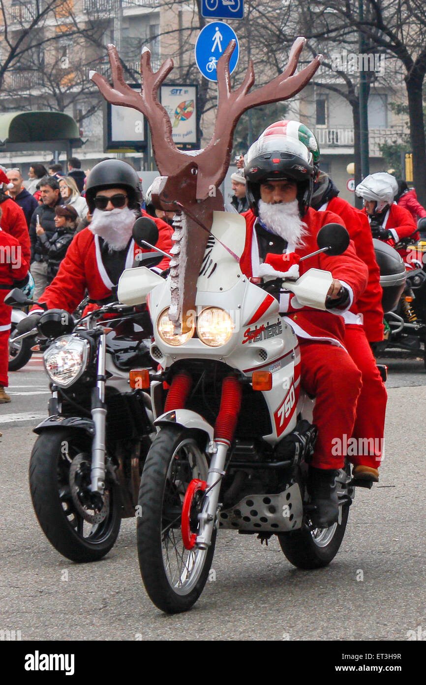 Hundreds of riders dressed as Santa Claus join a motorcycle charity ...