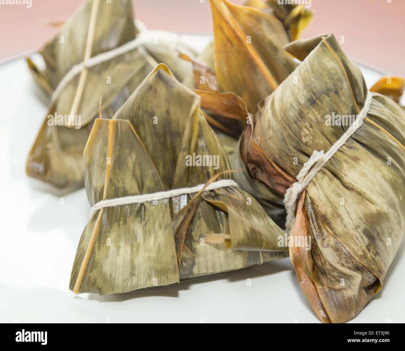 Zongzi in a plate. Zhongzi is a traditional Chinese food eaten during ...