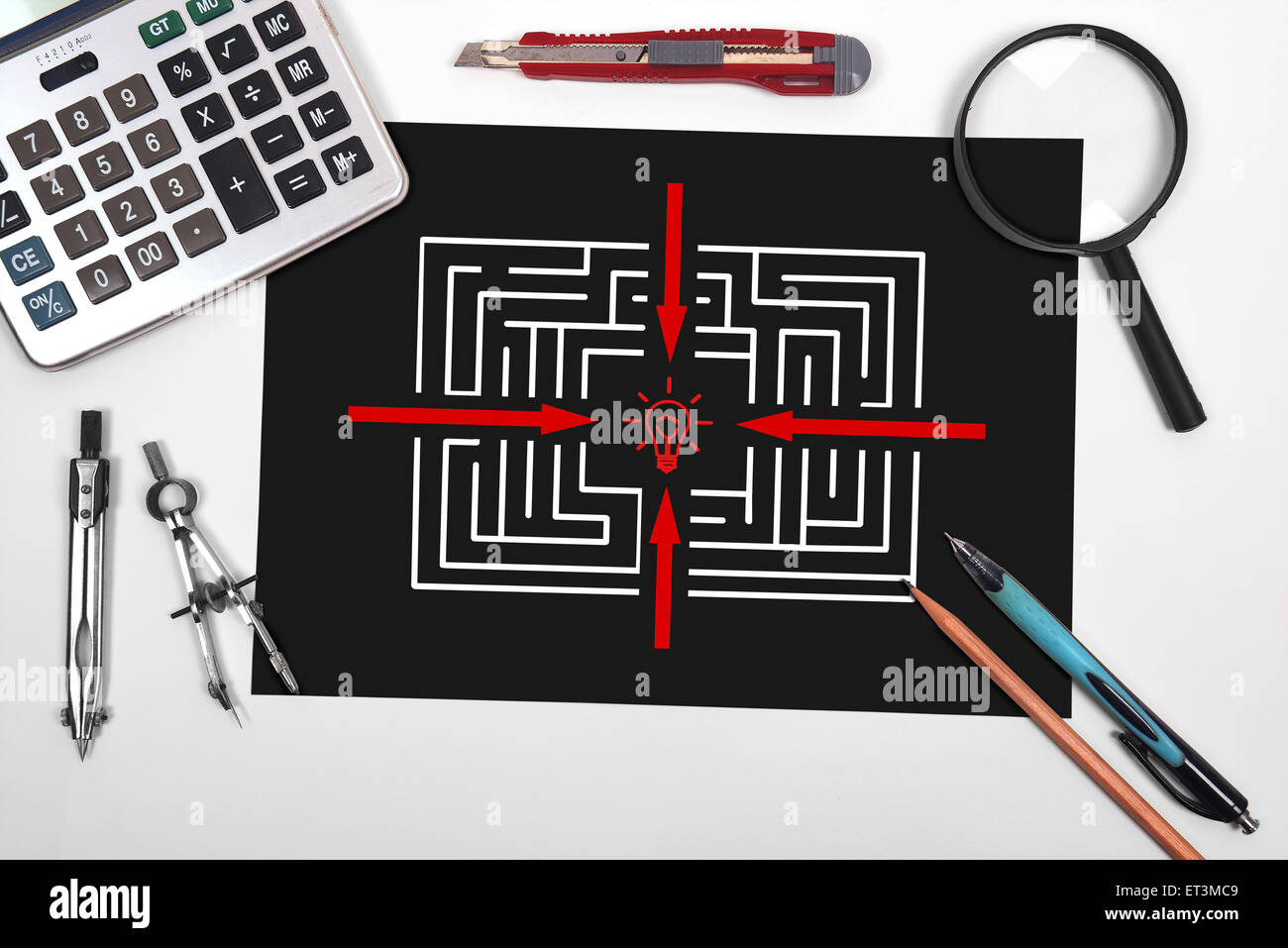 black paper with maze and tools on desktop engineer Stock Photo - Alamy