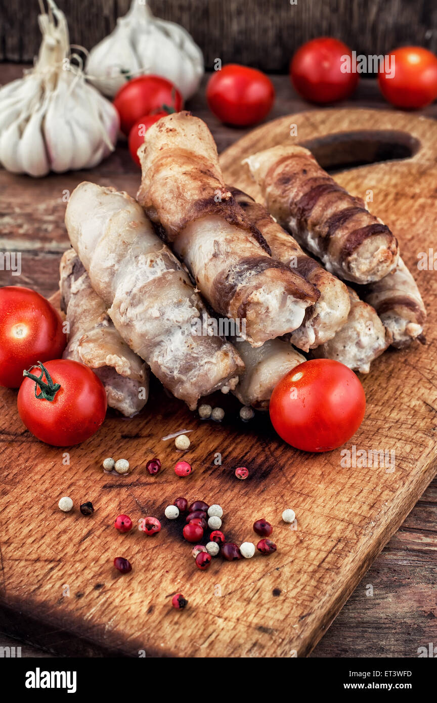 cooked meat products with spices and tomatoes.Selective focus.Photo ...
