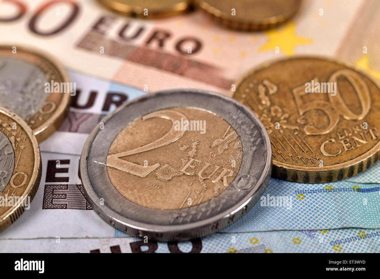 Euro Bills and Coins, extra close up Stock Photo - Alamy