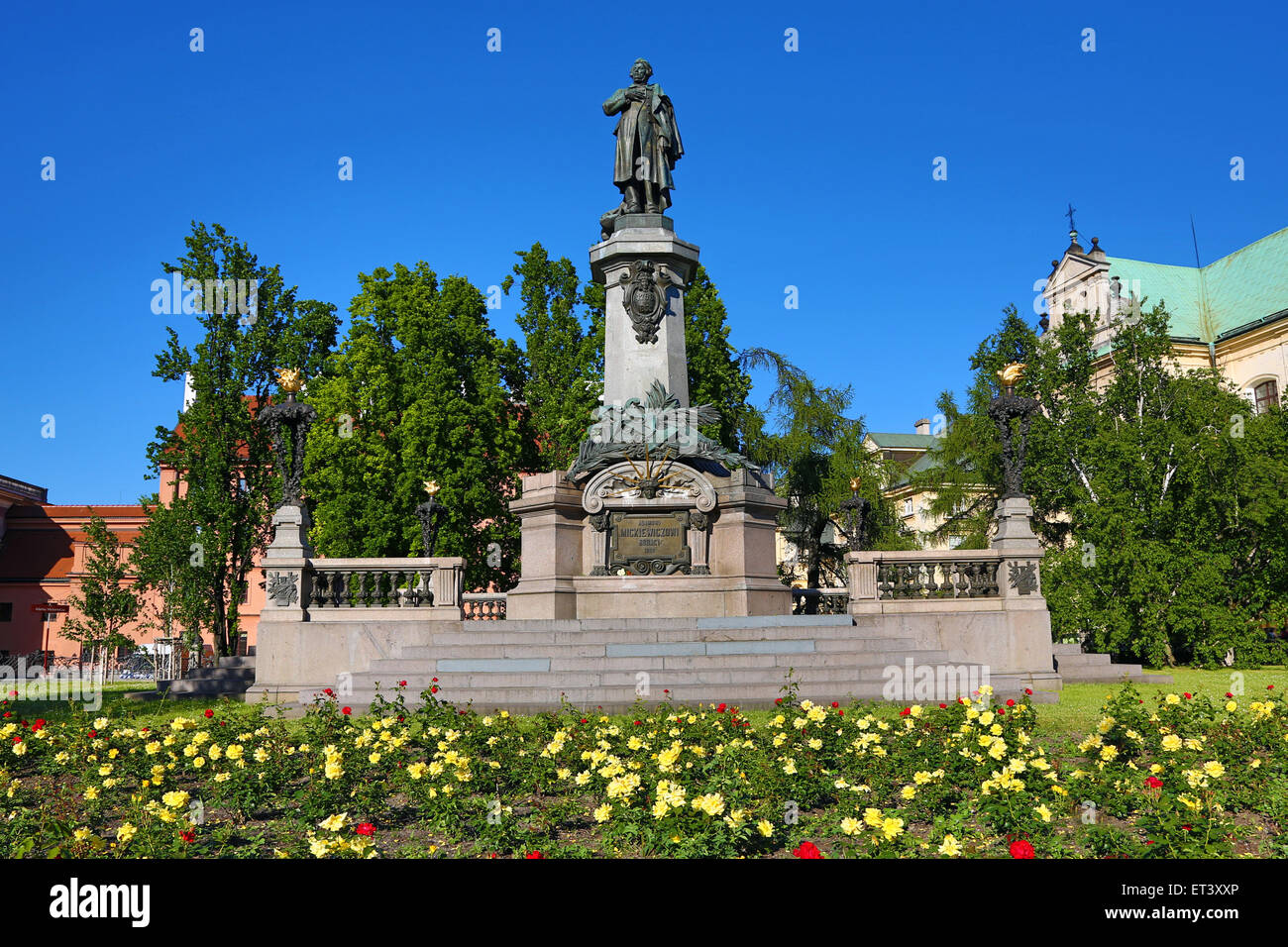 Statue and monument of Adam Mickiewicz in Warsaw, Poland Stock Photo ...