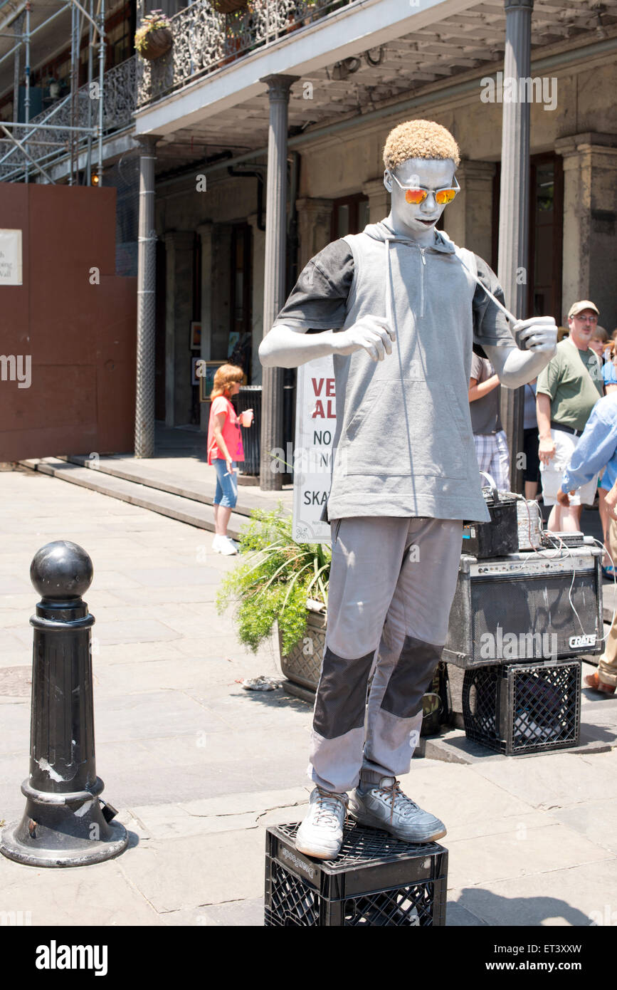 Silver painted street performer in hi-res stock photography and images ...