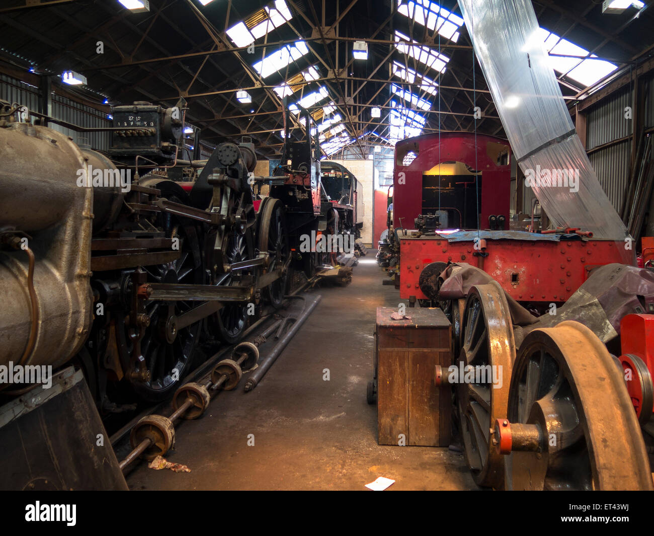vintage steam locomotive in the maintenance shed at Loughborough ...