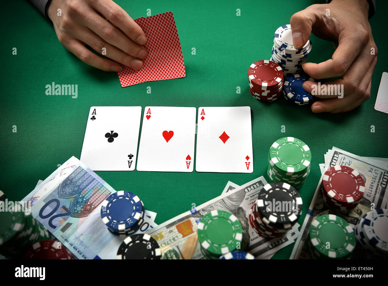 three aces on green table. close up Stock Photo - Alamy