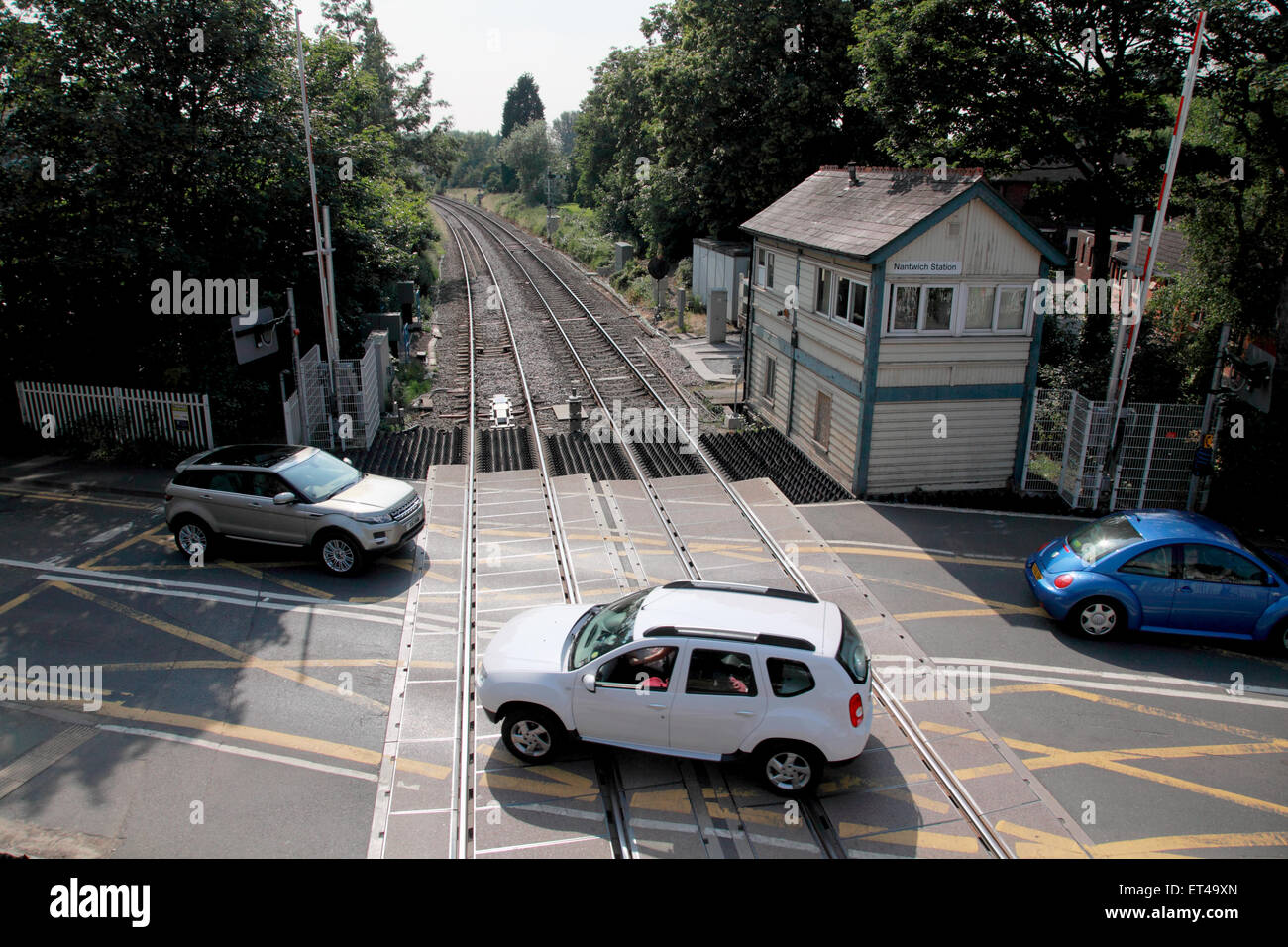 The level crossing and signal box by the railway station in Nantwich ...