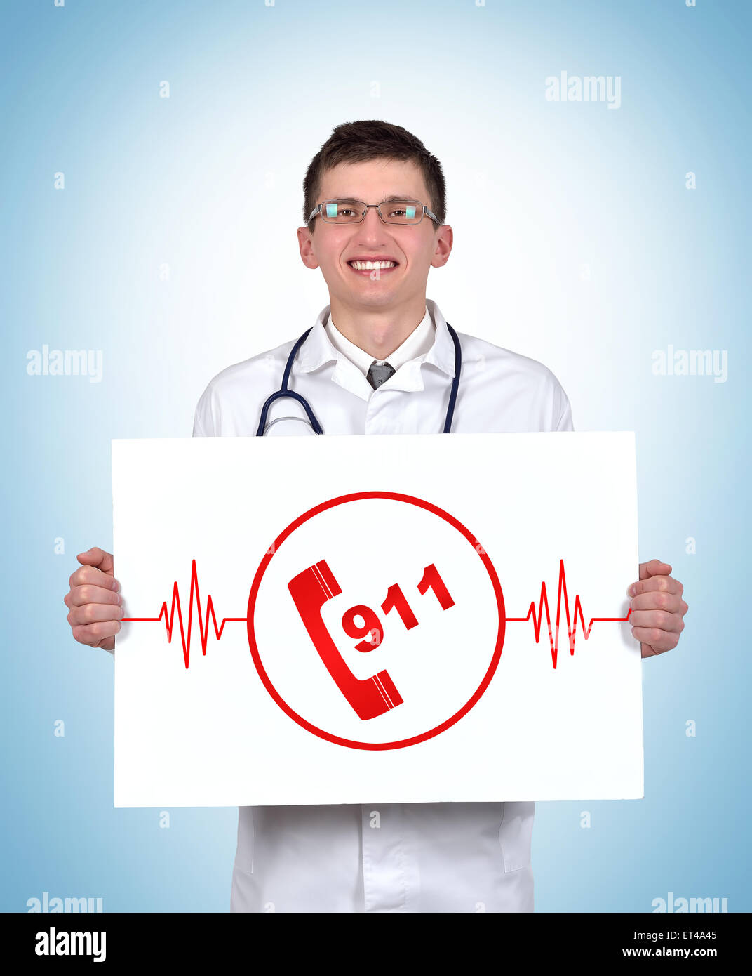 doctor holding placard with 911 symbol on blue background Stock Photo ...