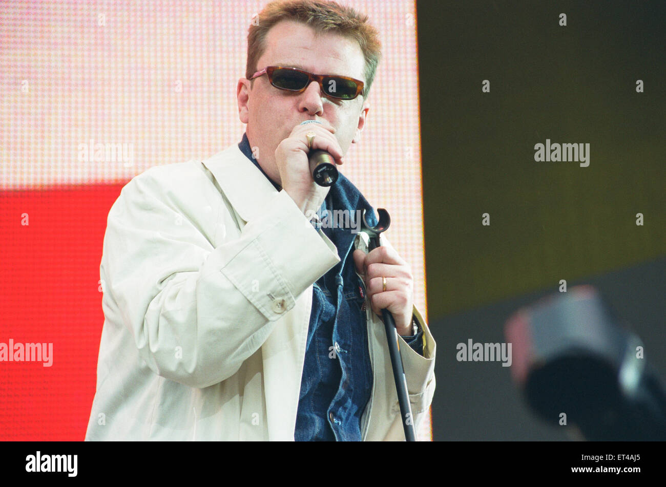 Suggs, lead singer of British ska group Madness, performing at Party in ...