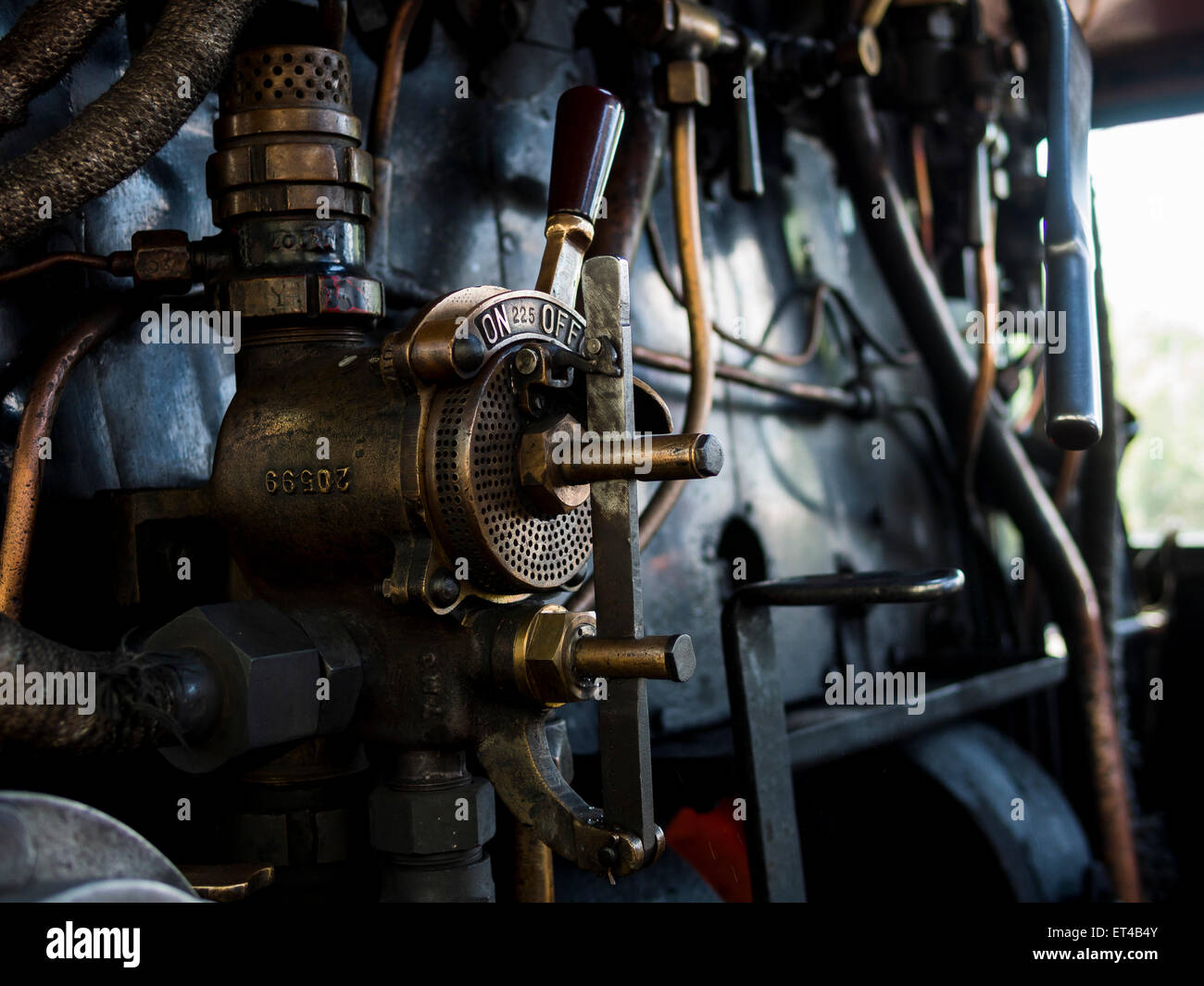 controls of a vintage steam locomotive at Loughborough station, on the ...