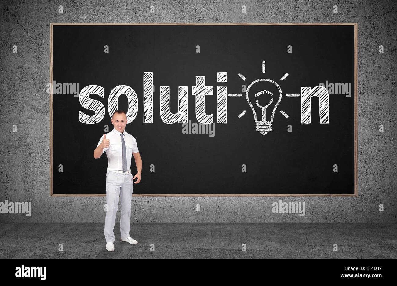 businessman showing thumb up and drawing solution on blackboard Stock ...