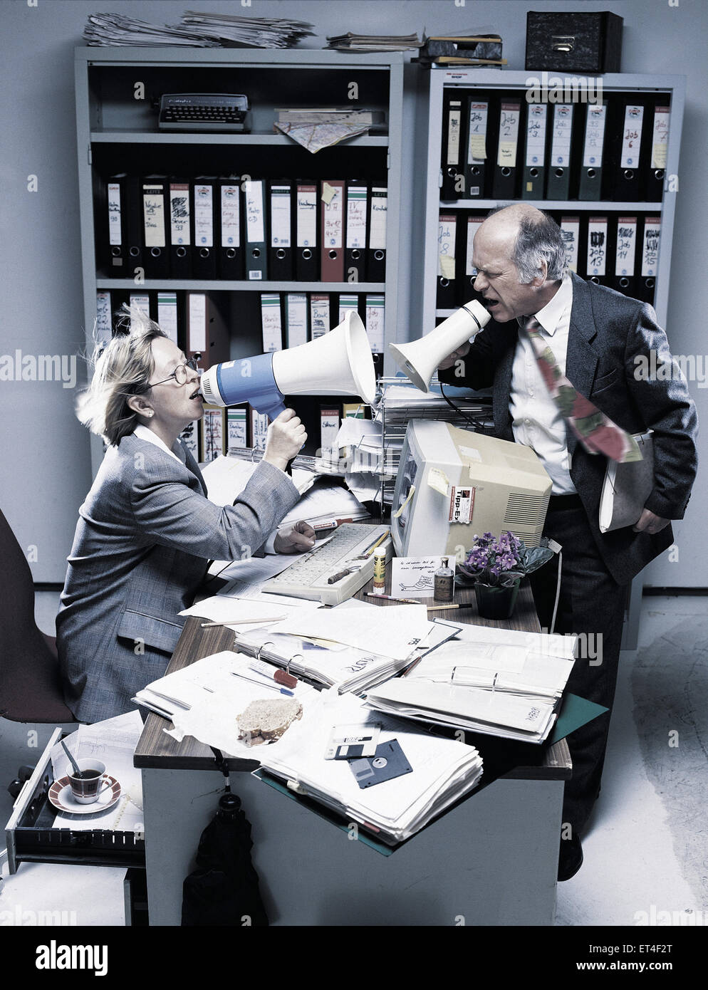 Hamburg, Germany, woman and man yelling at with megaphones Stock Photo ...