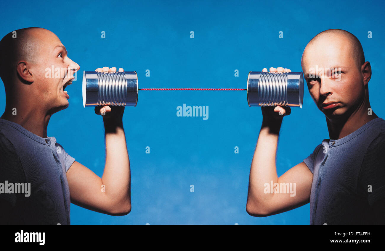 Hamburg, Germany, two men chat with Dosentelefon Stock Photo - Alamy