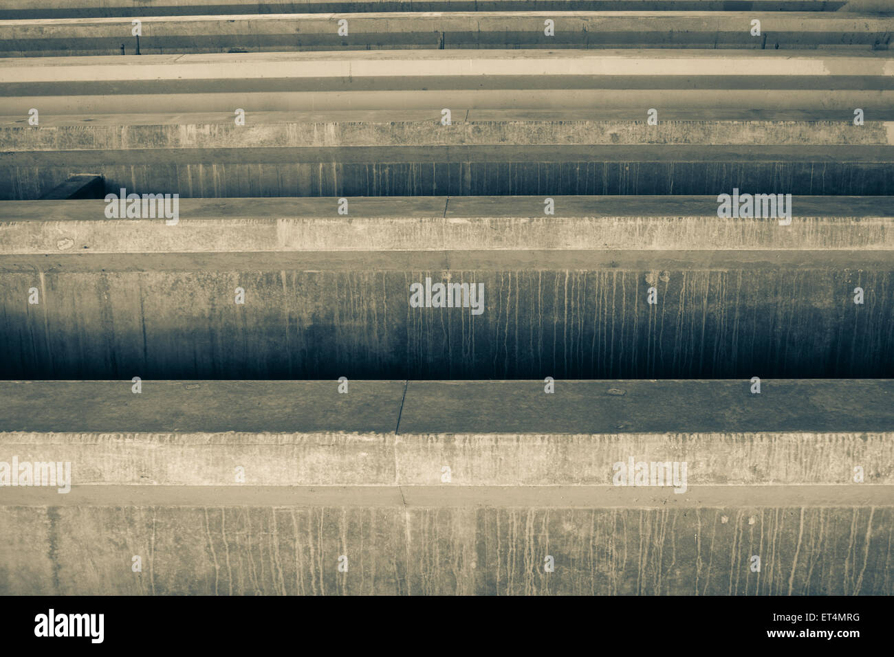 Black and white parallel lines run horizontally across the composition ...