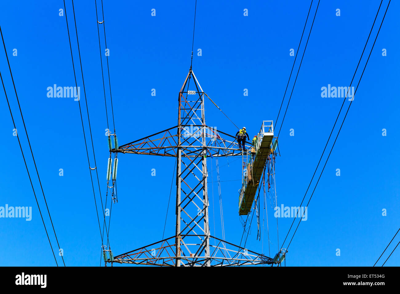 Man working high voltage pylon hi-res stock photography and images - Alamy
