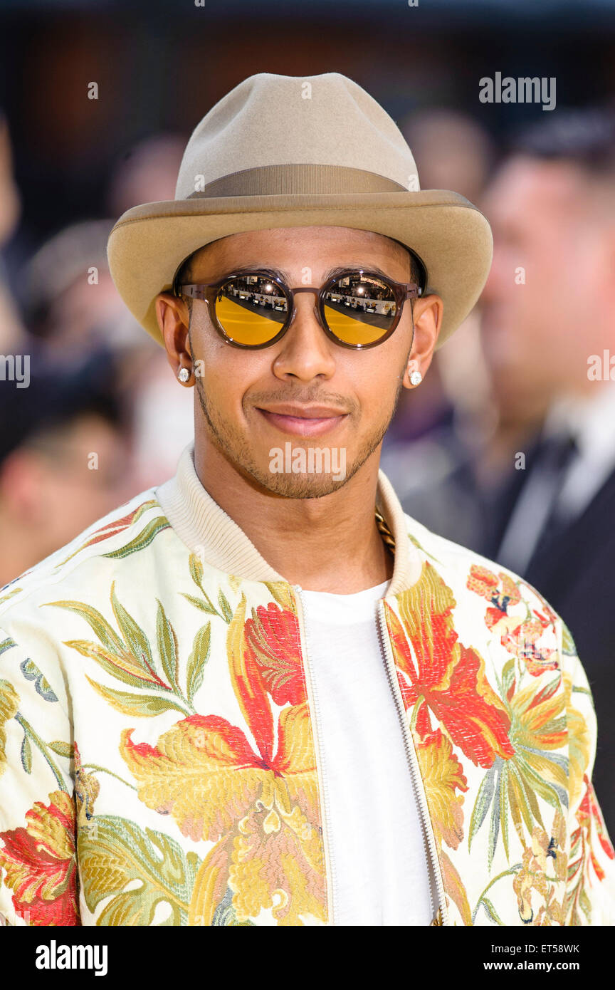 Lewis Hamilton arrives on the yellow carpet for the The World Premiere ...