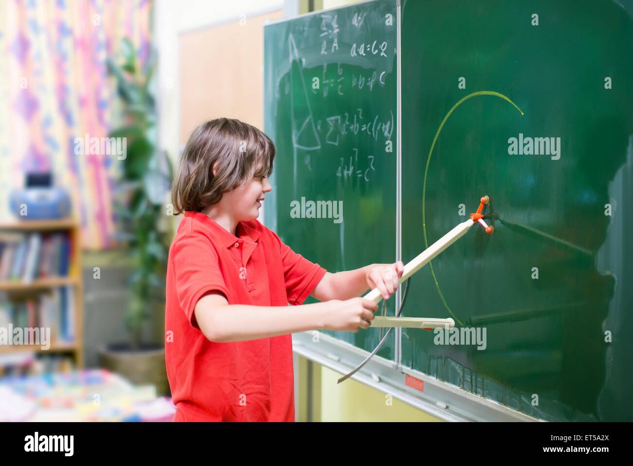 Happy smiling student boy enjoying his first day back to school at a ...