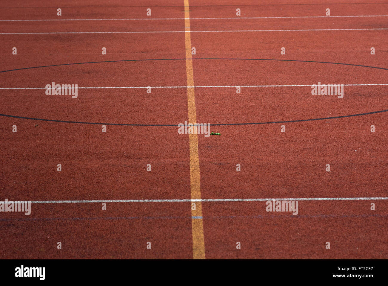 Piece of red basketball field Stock Photo - Alamy