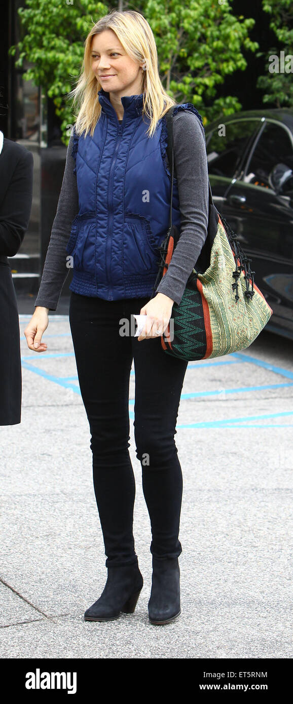 Amy Smart wearing a padded waistcoat out and about running errands in ...