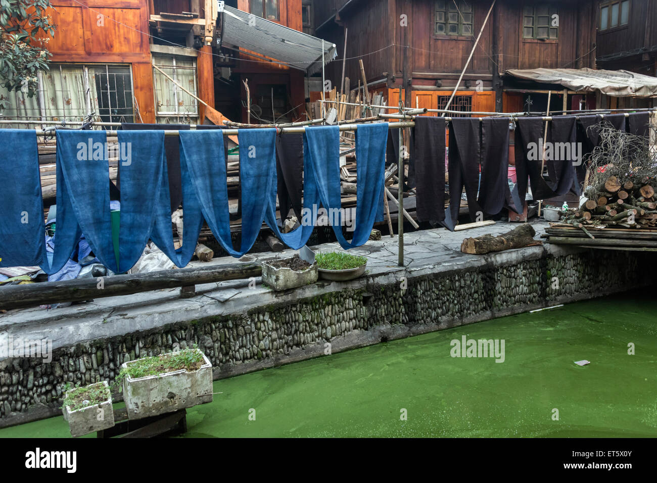 Drying traditional indigo-dyed cotton cloth, Zhaoxing Dong Village ...