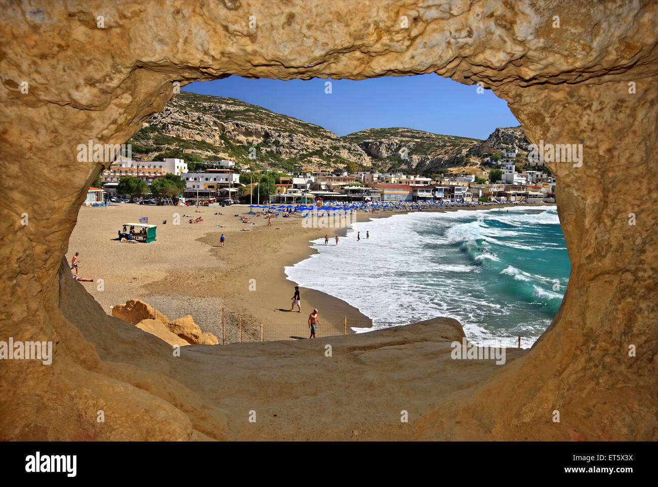 Matala beach with its famous caves, once "home" for many hippies, to ...