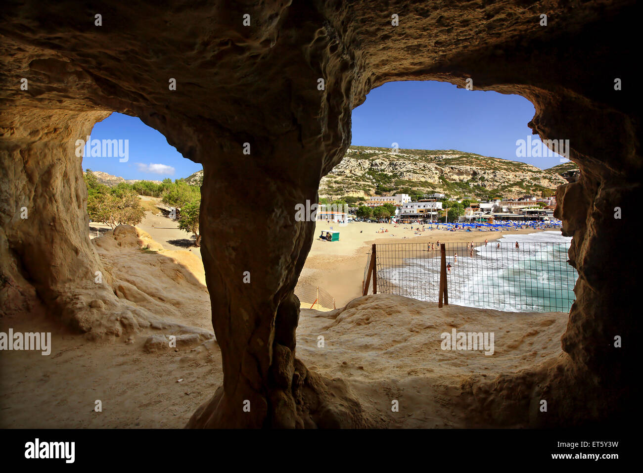 Matala beach with its famous caves, once "home" for many hippies, to ...