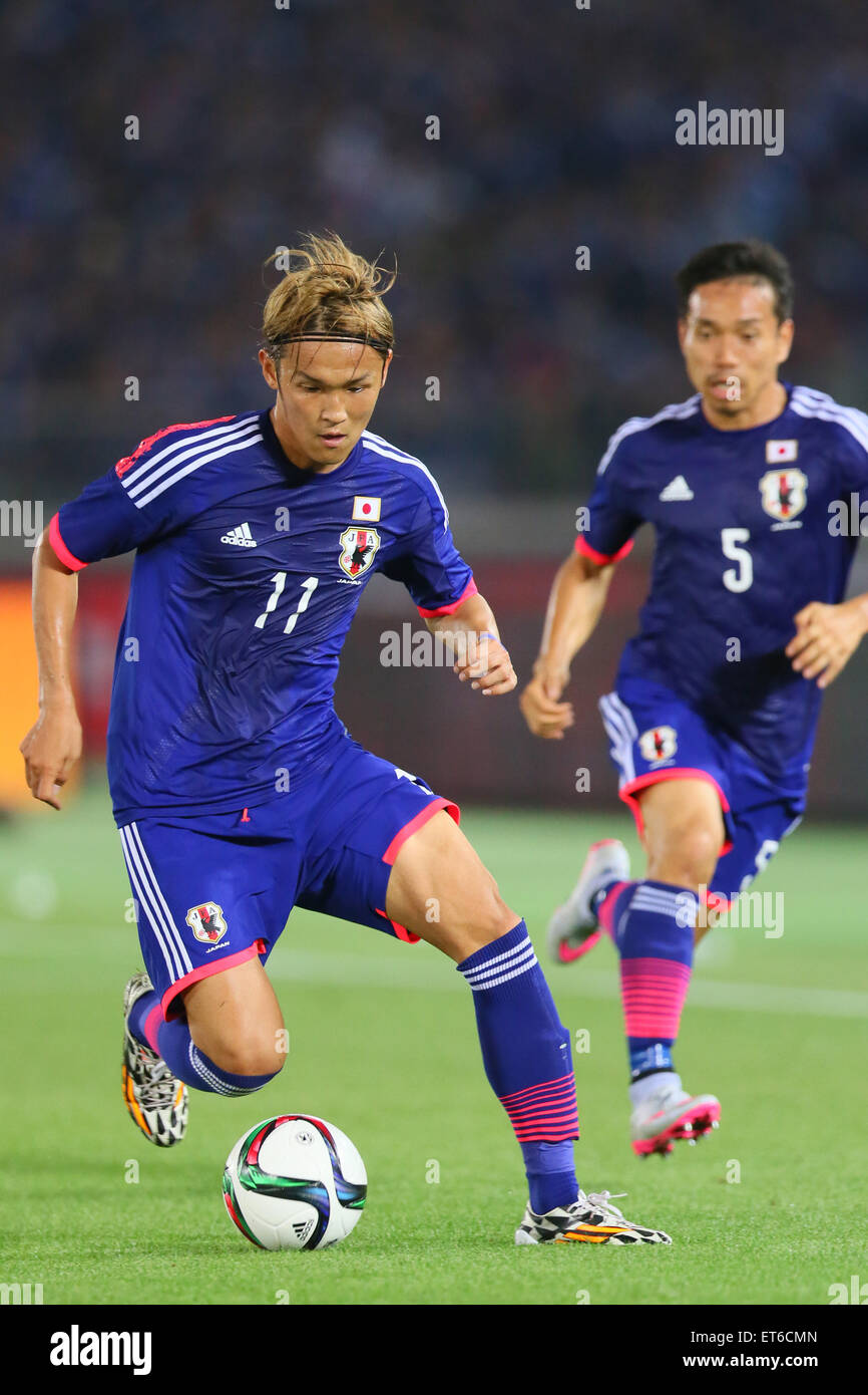 Kanagawa, Japan. 11th June, 2015. (L-R) Takashi Usami, Yuto Nagatomo ...