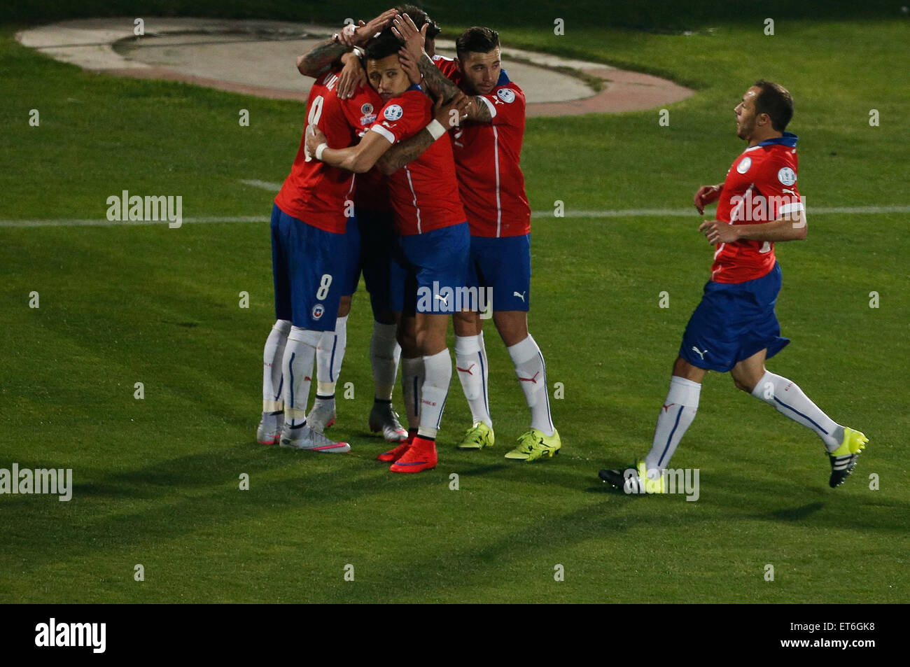 Santiago, Chile. 11th June, 2015. Players from Chile celebrate scoring ...