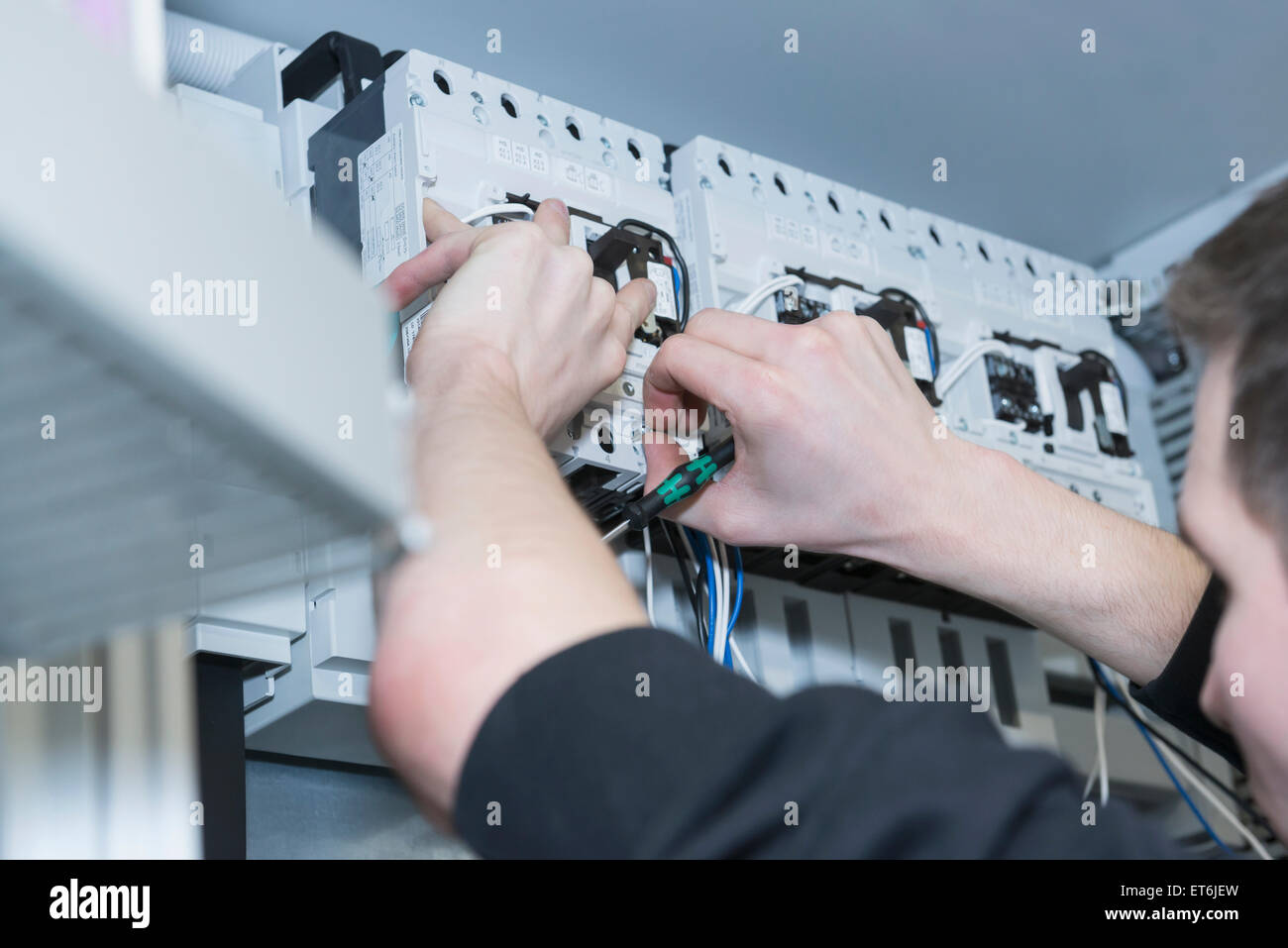 Fusebox electrician man hi-res stock photography and images - Alamy
