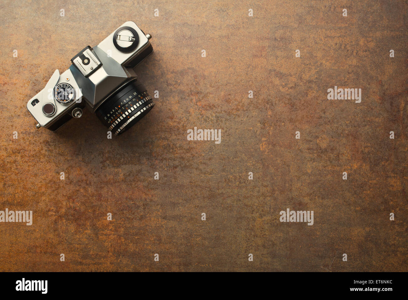 old analogue camera on rusty background Stock Photo - Alamy