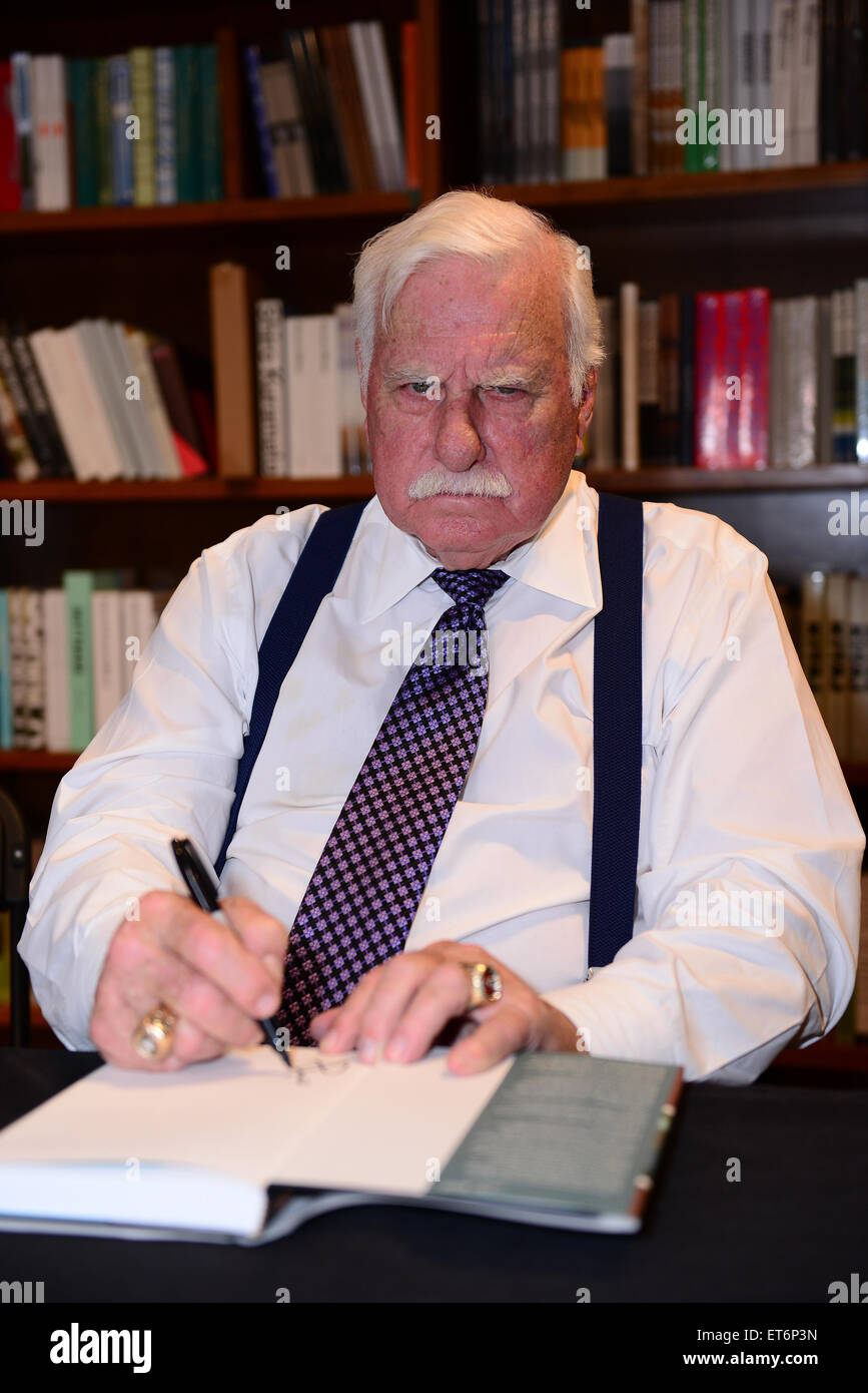 Howard Schnellenberger signs copies of his book entitled 'Passing The ...