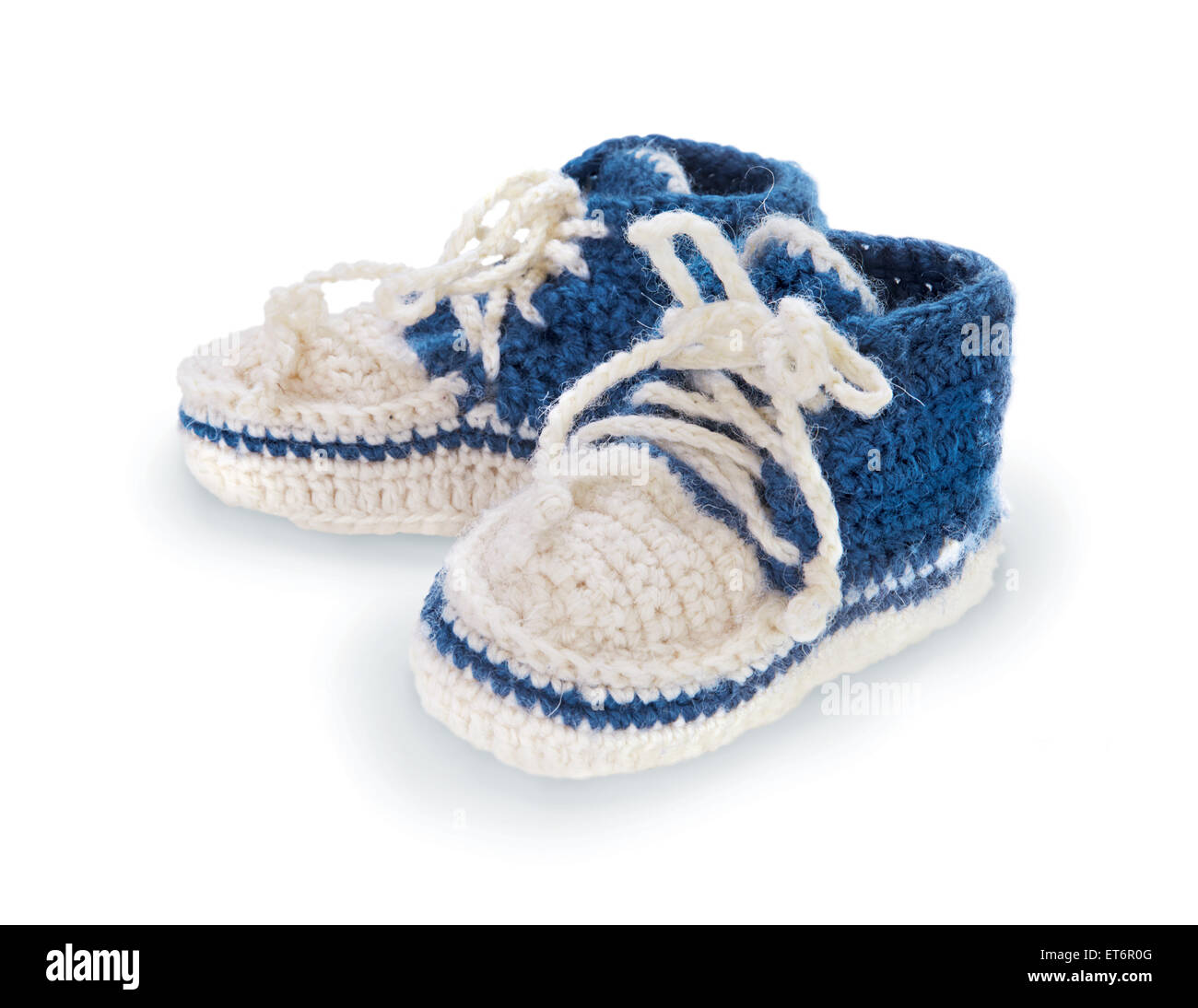 Handmade blue baby booties isolated on a white background Stock Photo ...