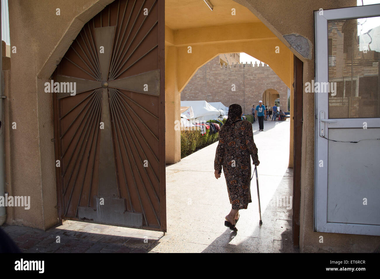 Iraqi Christians take shelter in the Mazar Mar Eillia church in Erbil ...