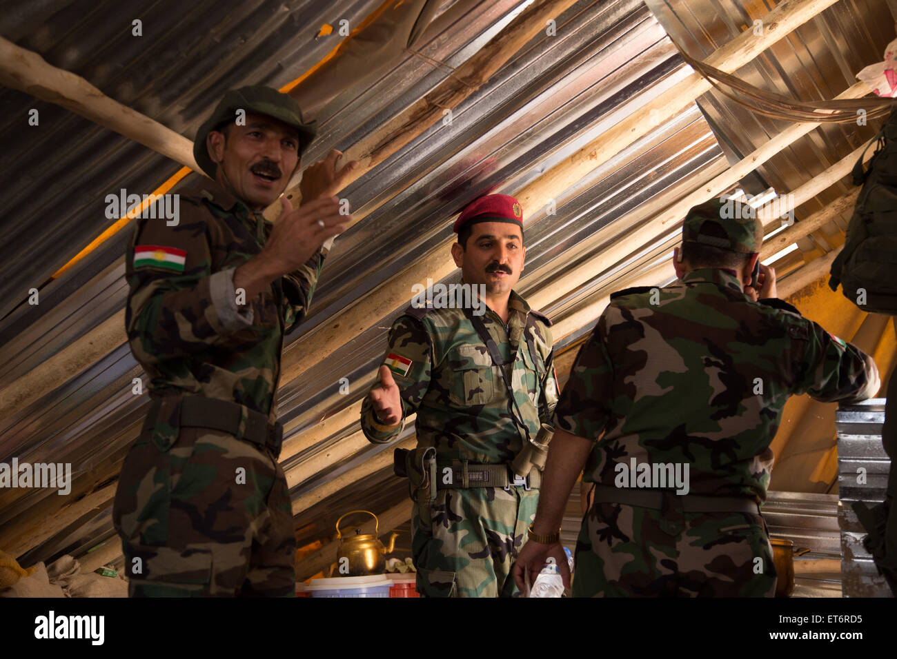 Peshmerga fighters stand ready at the Al Rash front line against ISIS ...
