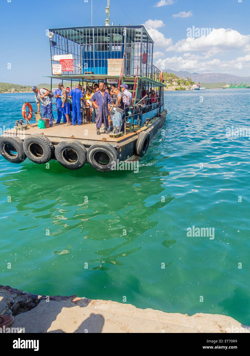 Crowded ferry boat to Cayo Granma (Island), Cuba in Santiago de Cuba ...