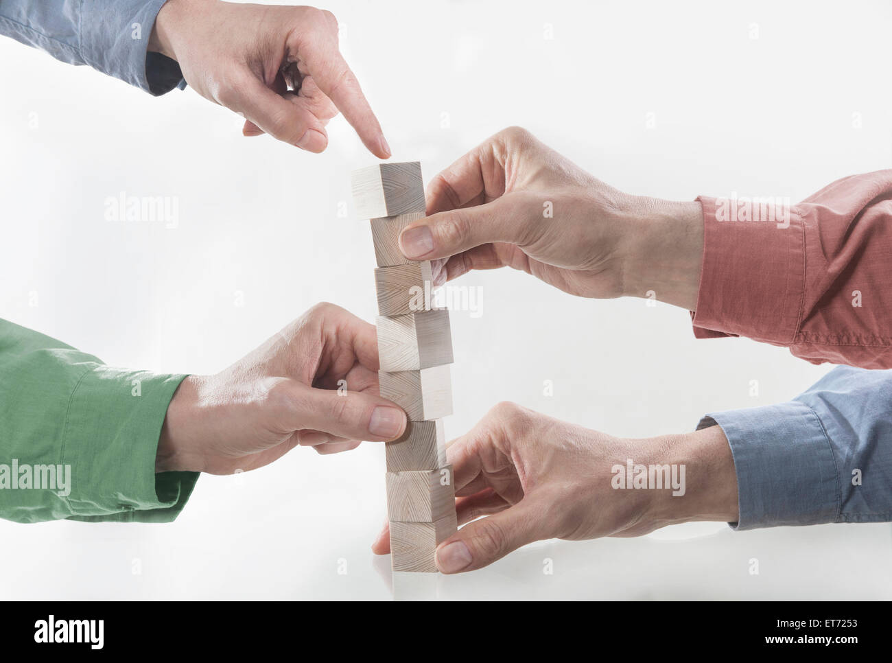 Hands wood balance tower hi-res stock photography and images - Alamy