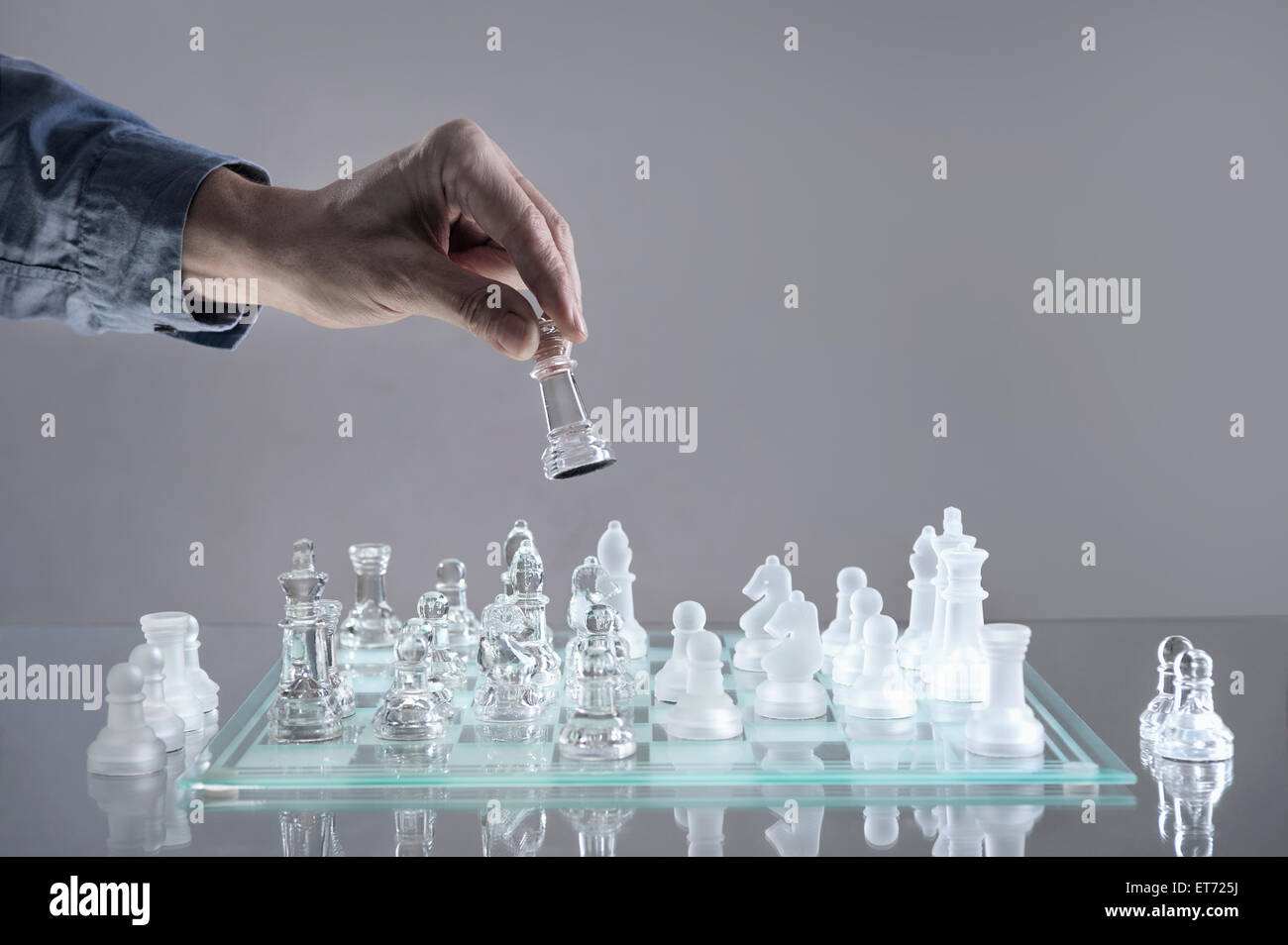 Close-up of man's hand going for checkmate while playing chess, Bavaria ...