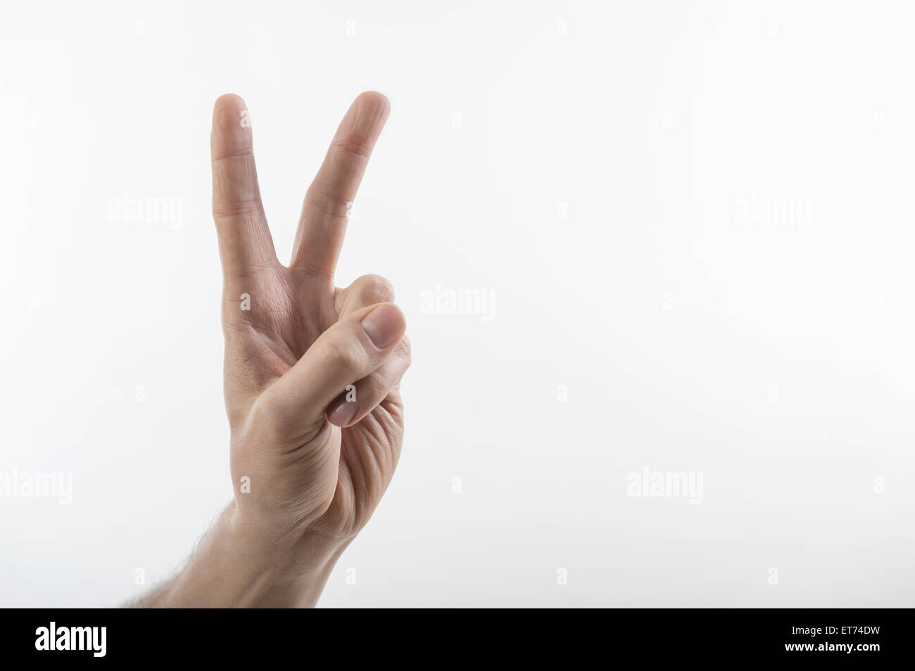 Man making peace sign hi-res stock photography and images - Alamy