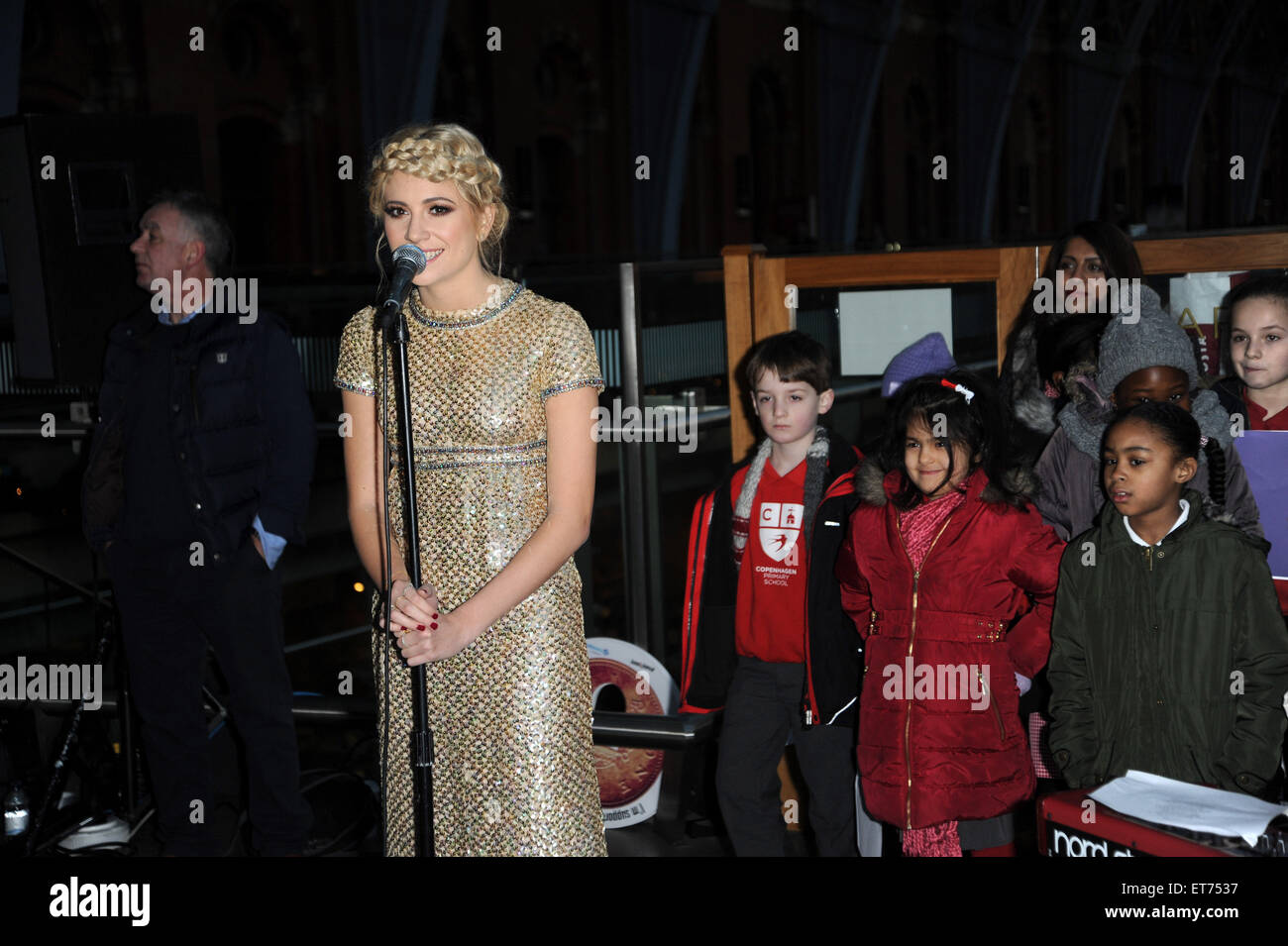 Pixie Lott sings with childrens choir at St Pancras station in aid of ...