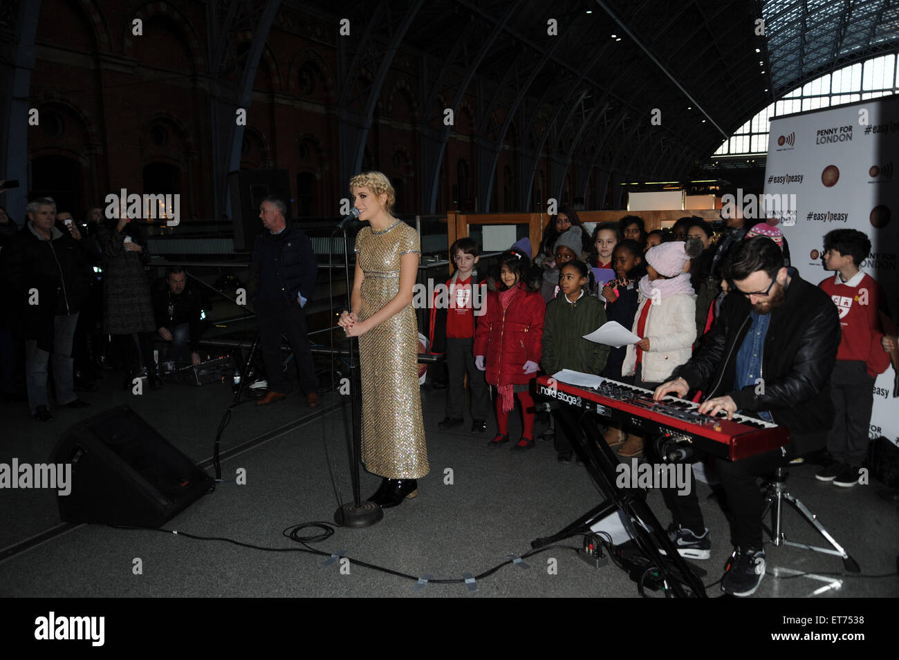 Pixie Lott sings with childrens choir at St Pancras station in aid of ...