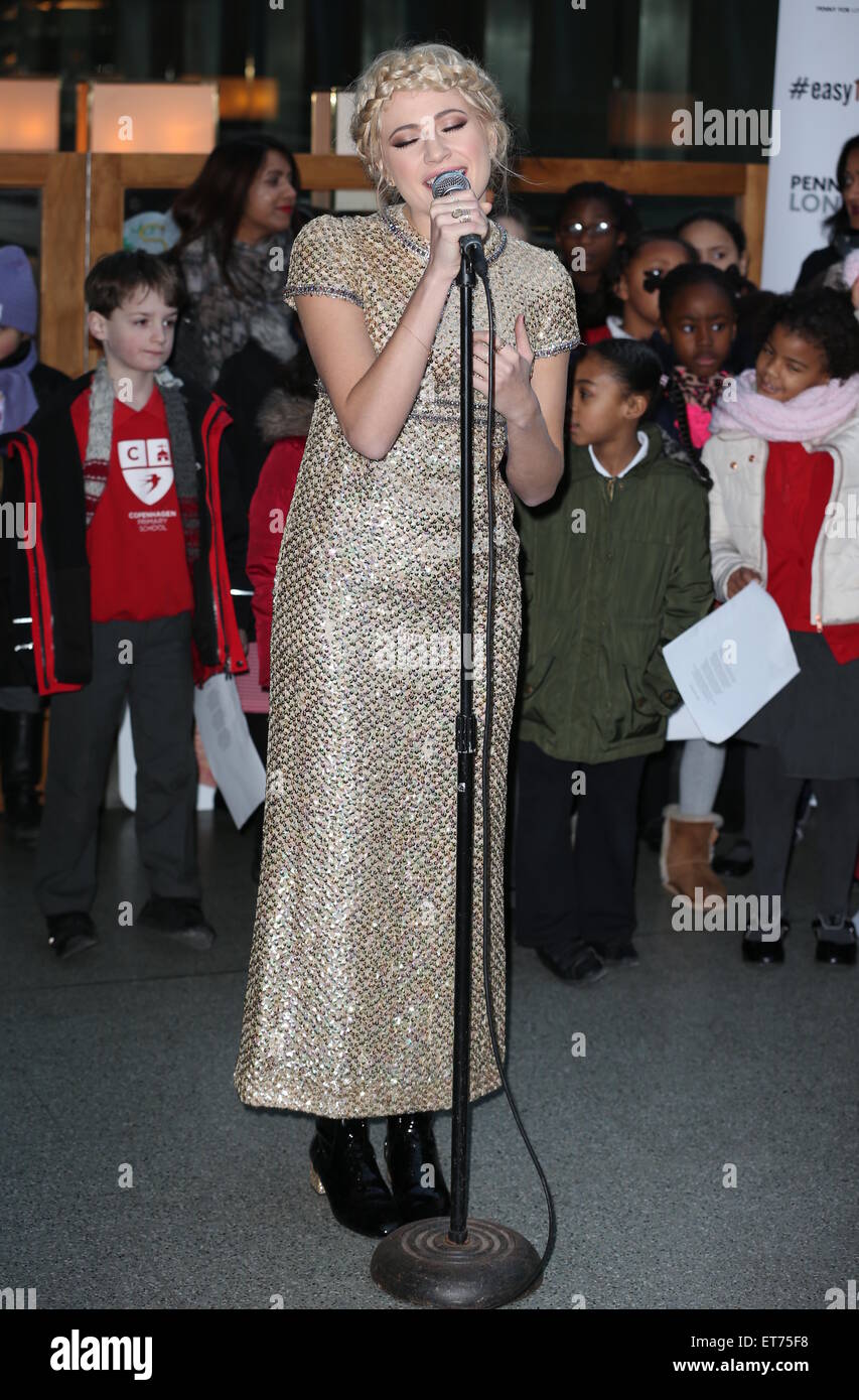 Pixie Lott performs with children from Copenhagen Primary School in aid ...