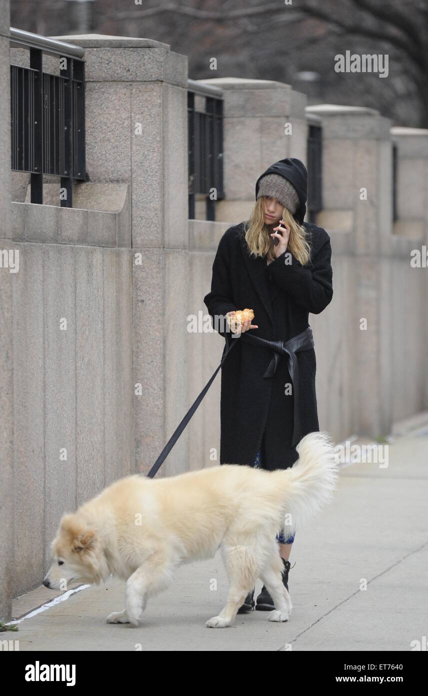 Suki Waterhouse out walking her dog on a cold day in Manhattan. She ...