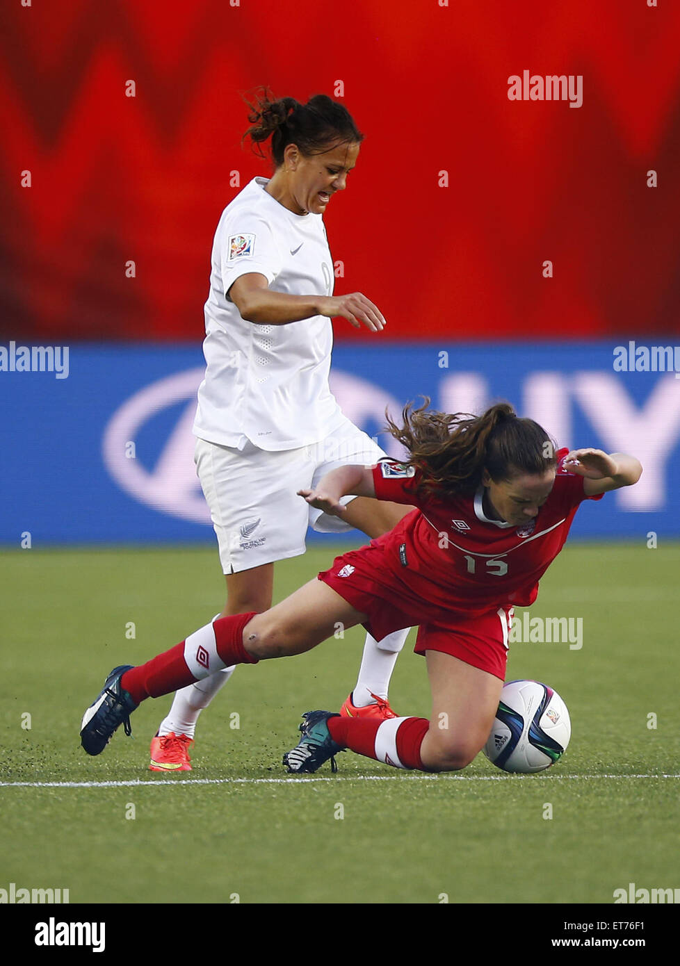 Edmonton. 11th June, 2015. Canada's Allysha Chapman (R) vies with New ...