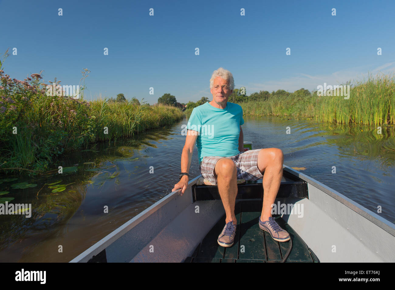 Man in motor boat hi-res stock photography and images - Alamy